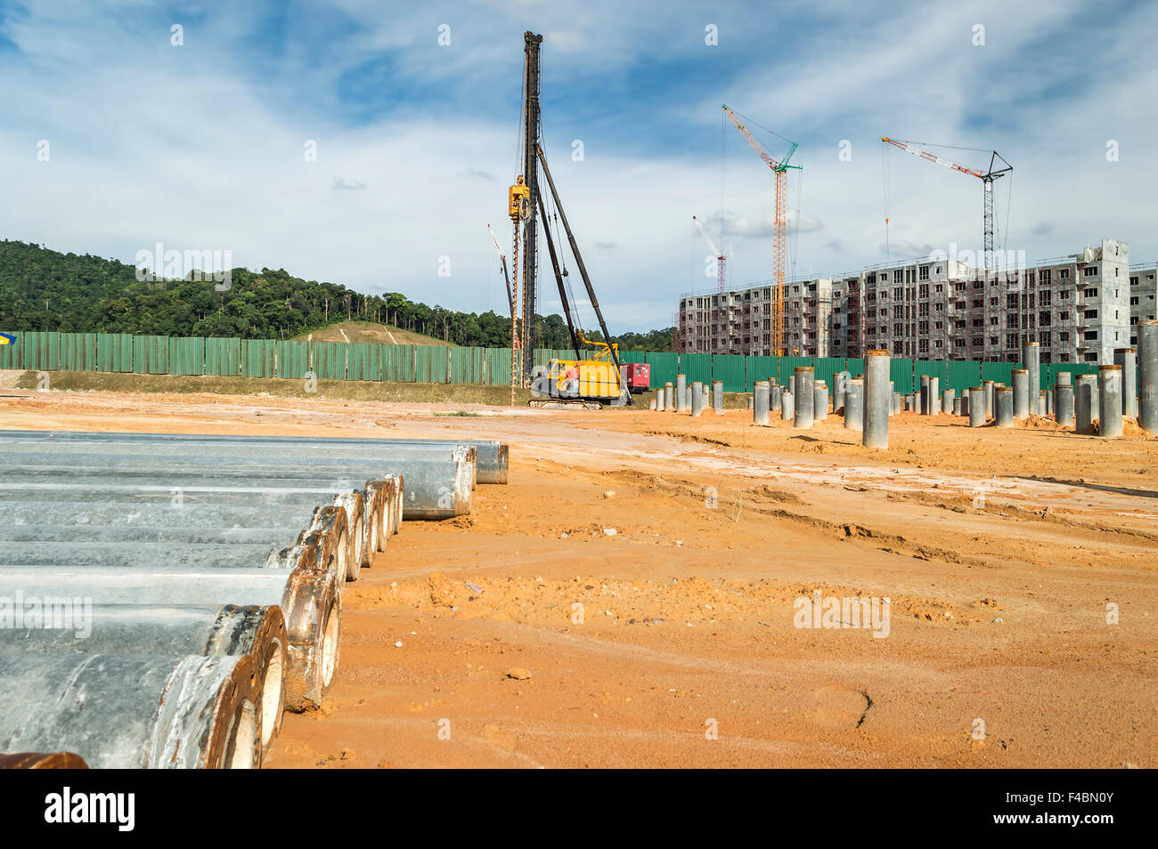 Stack of pile for base construction work Stock Photo - Alamy