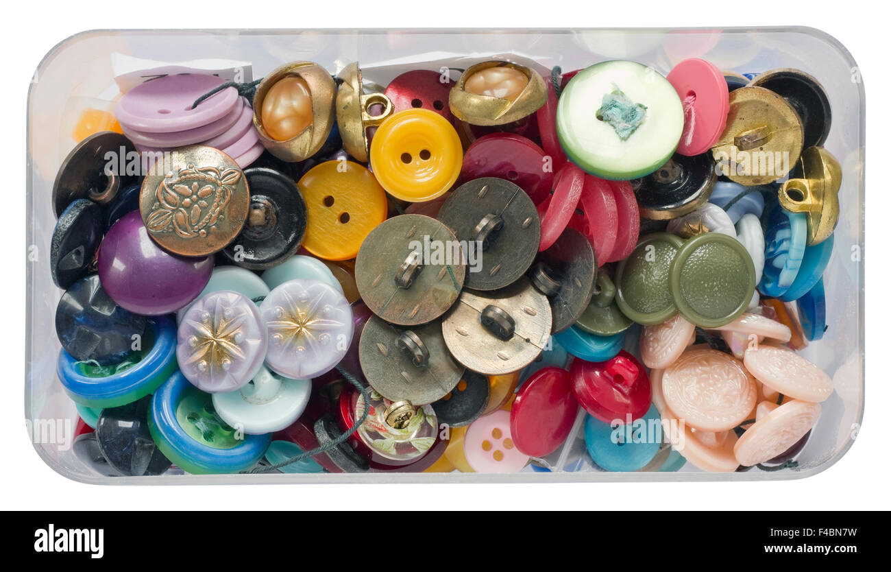 Old dusty vintage plastic buttons for repair of clothes in a box ...