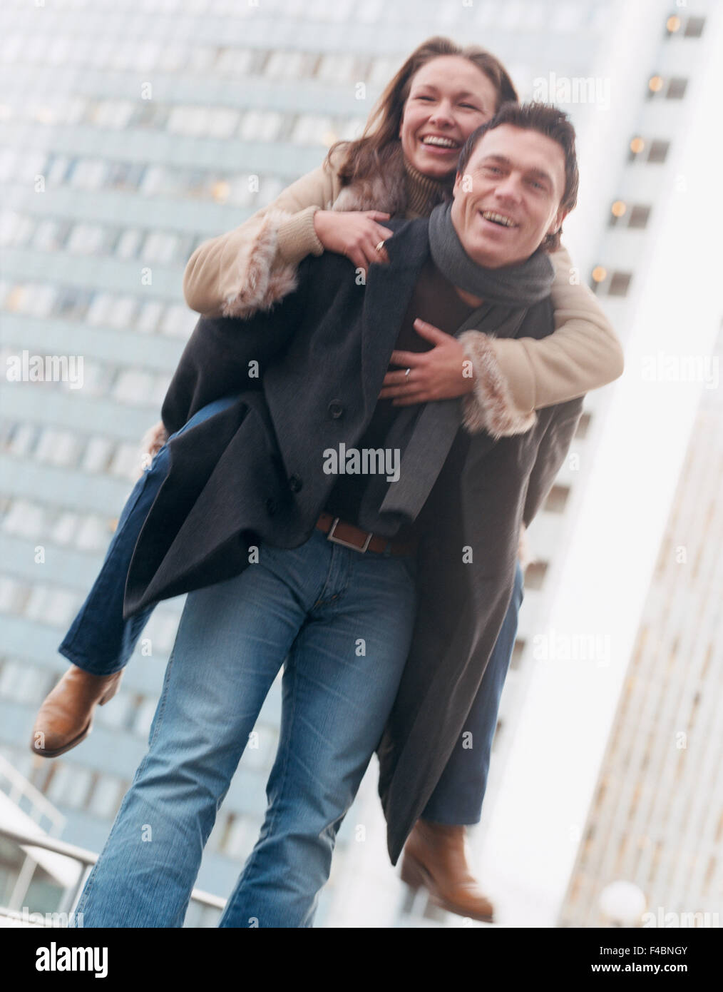 Woman lifting man on back hi-res stock photography and images - Alamy