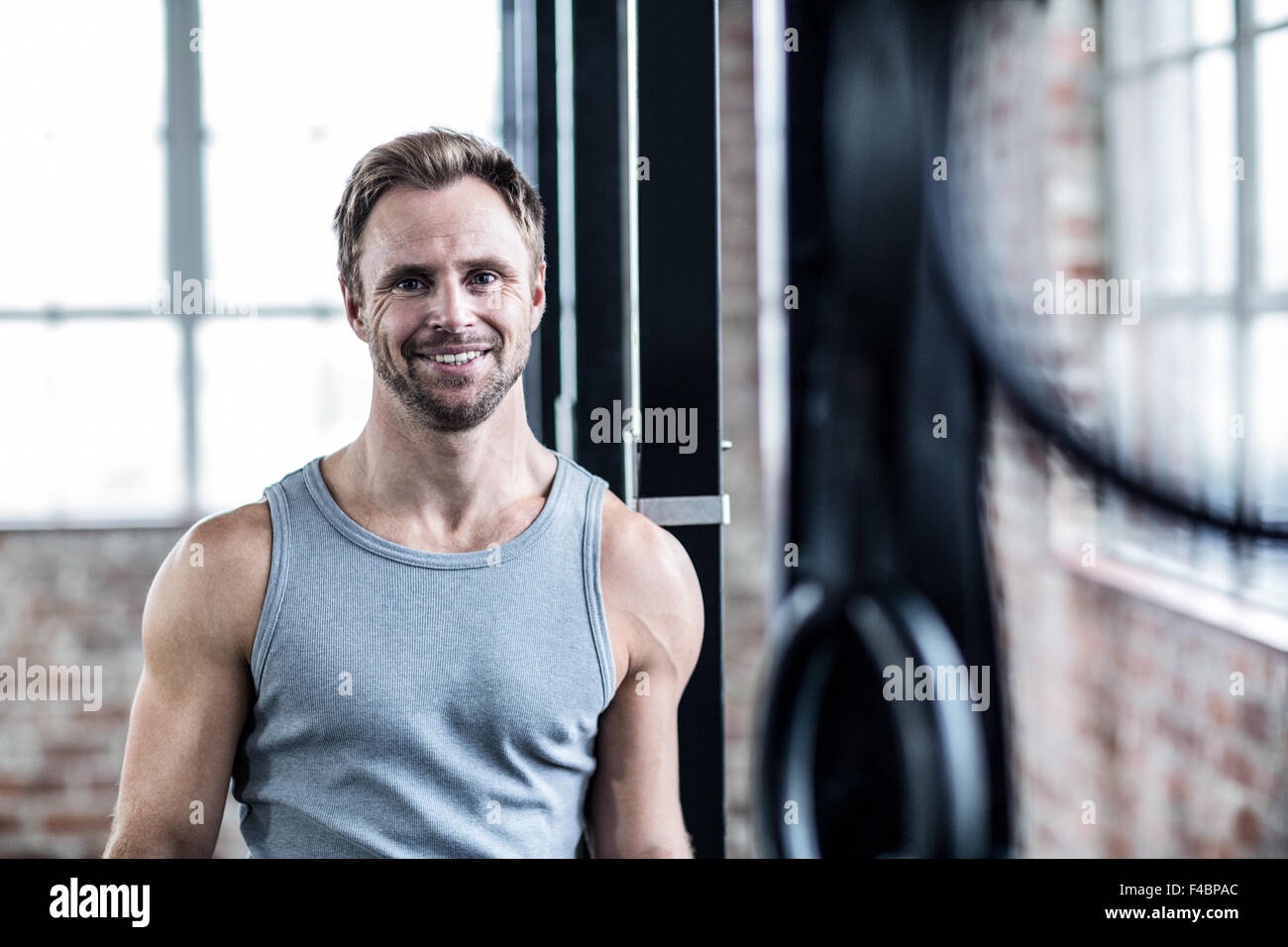 Fit smiling man looking the camera Stock Photo - Alamy
