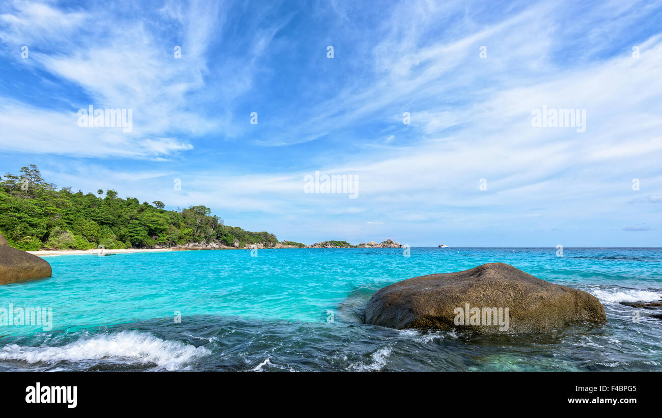 Beautiful landscape blue sky and sea on beach near the rocks during ...