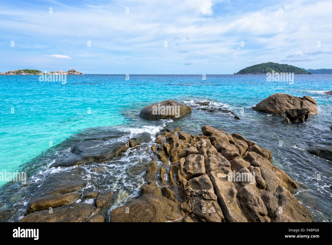 Beautiful landscape of blue sky sea and white waves on beach near the ...