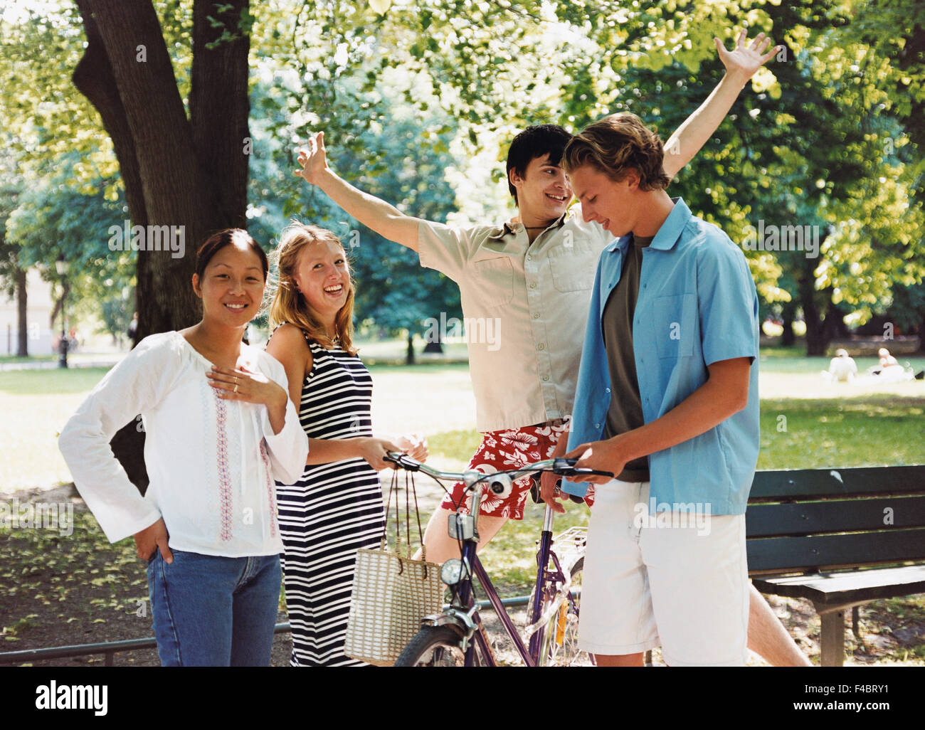 bicycle boys color image four people friends friendship girls happy ...