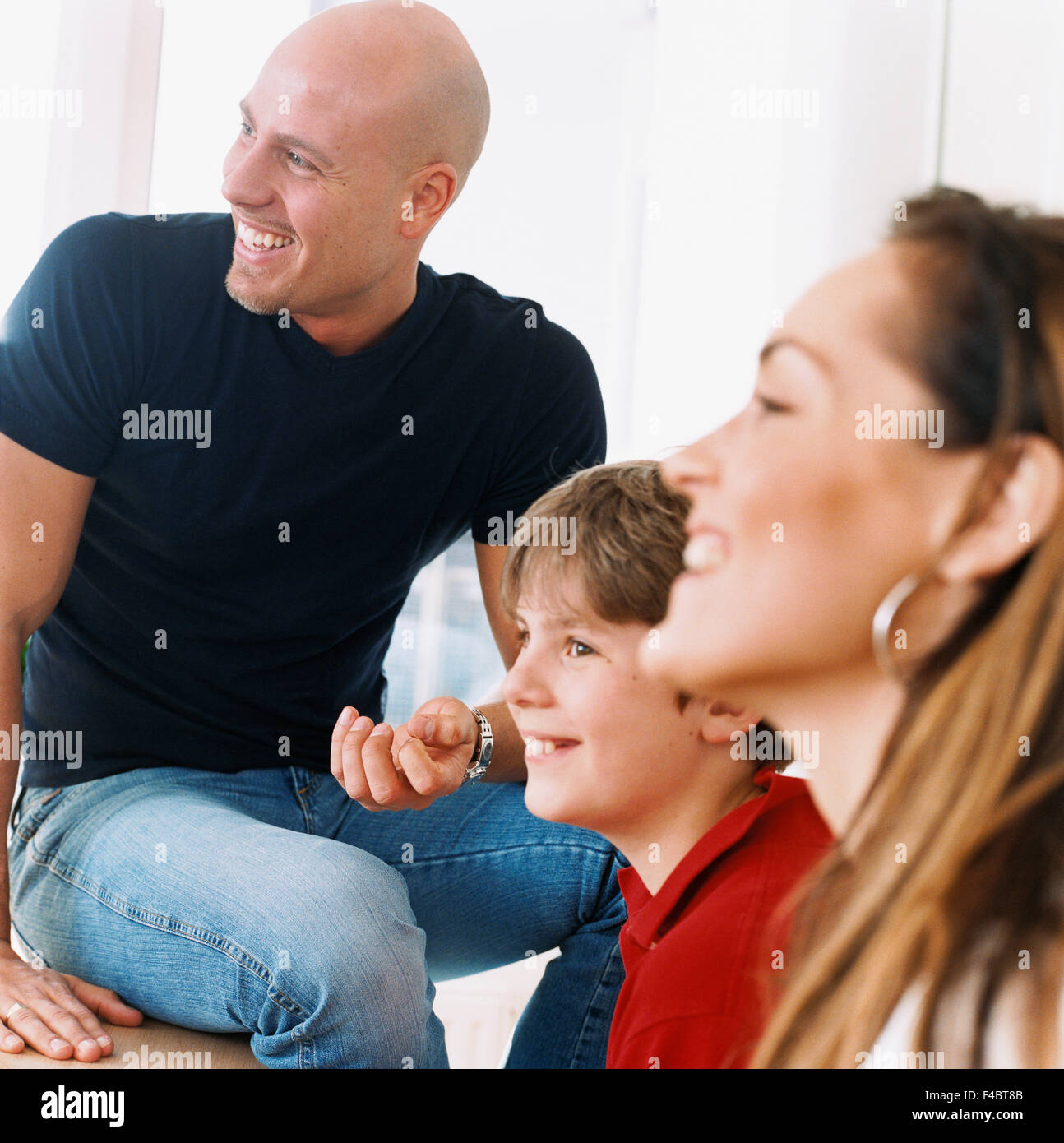bald headed boys brother brothers color image happy indoors laughing ...