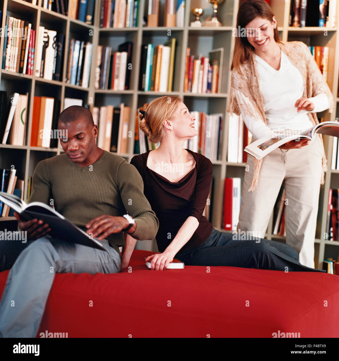 book color image dark skin diversity education library man reading Scandinavia school several ...
