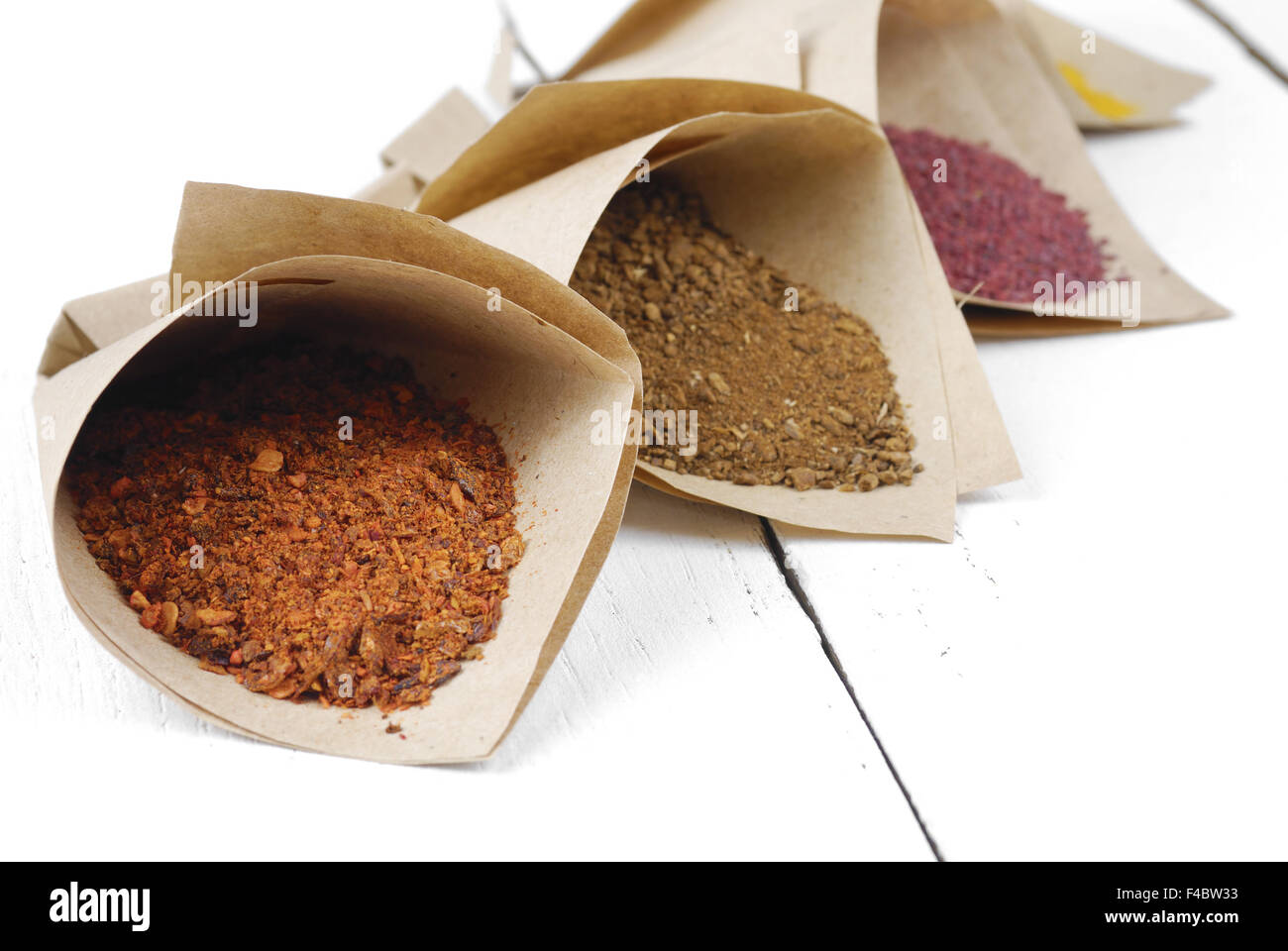 Paper envelopes with spices Stock Photo - Alamy
