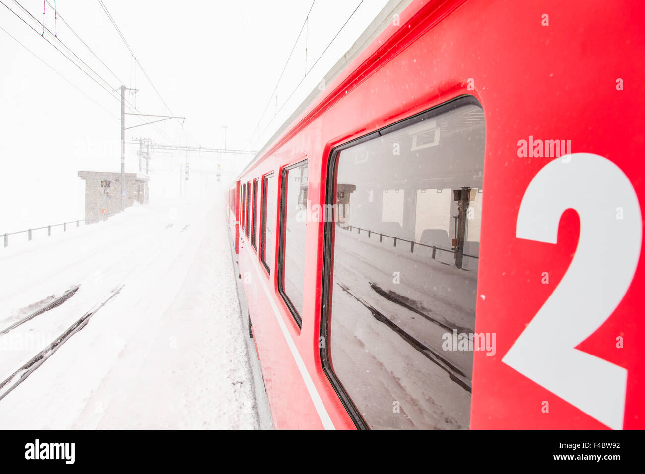 Train in the snow Stock Photo - Alamy