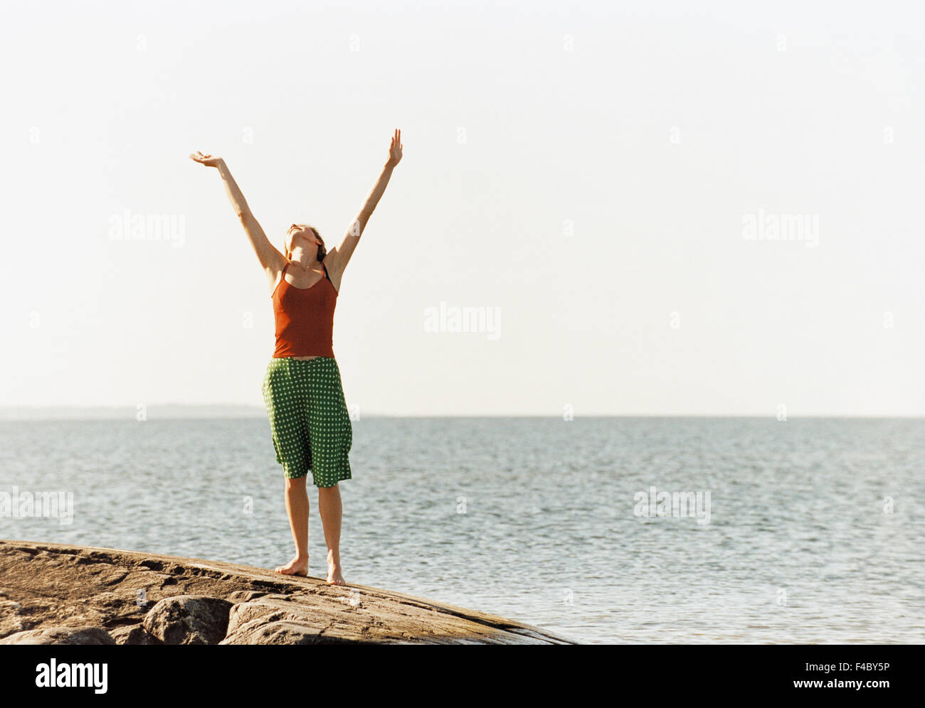 30-34 years adults only archipelago barefoot body language cheer cliff ...