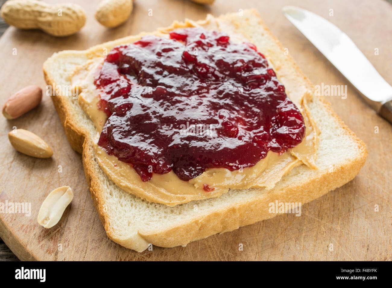 Close up white bread with peanut butter and jam Stock Photo - Alamy