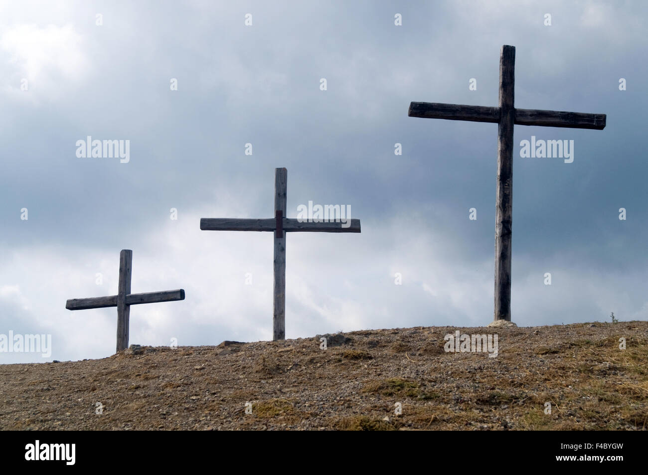 three wooden pole Stock Photo - Alamy