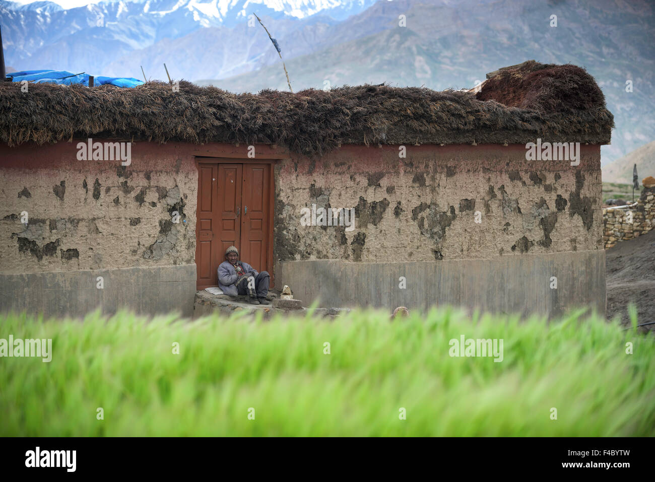 Old man busy with rosary and chanting Stock Photo - Alamy