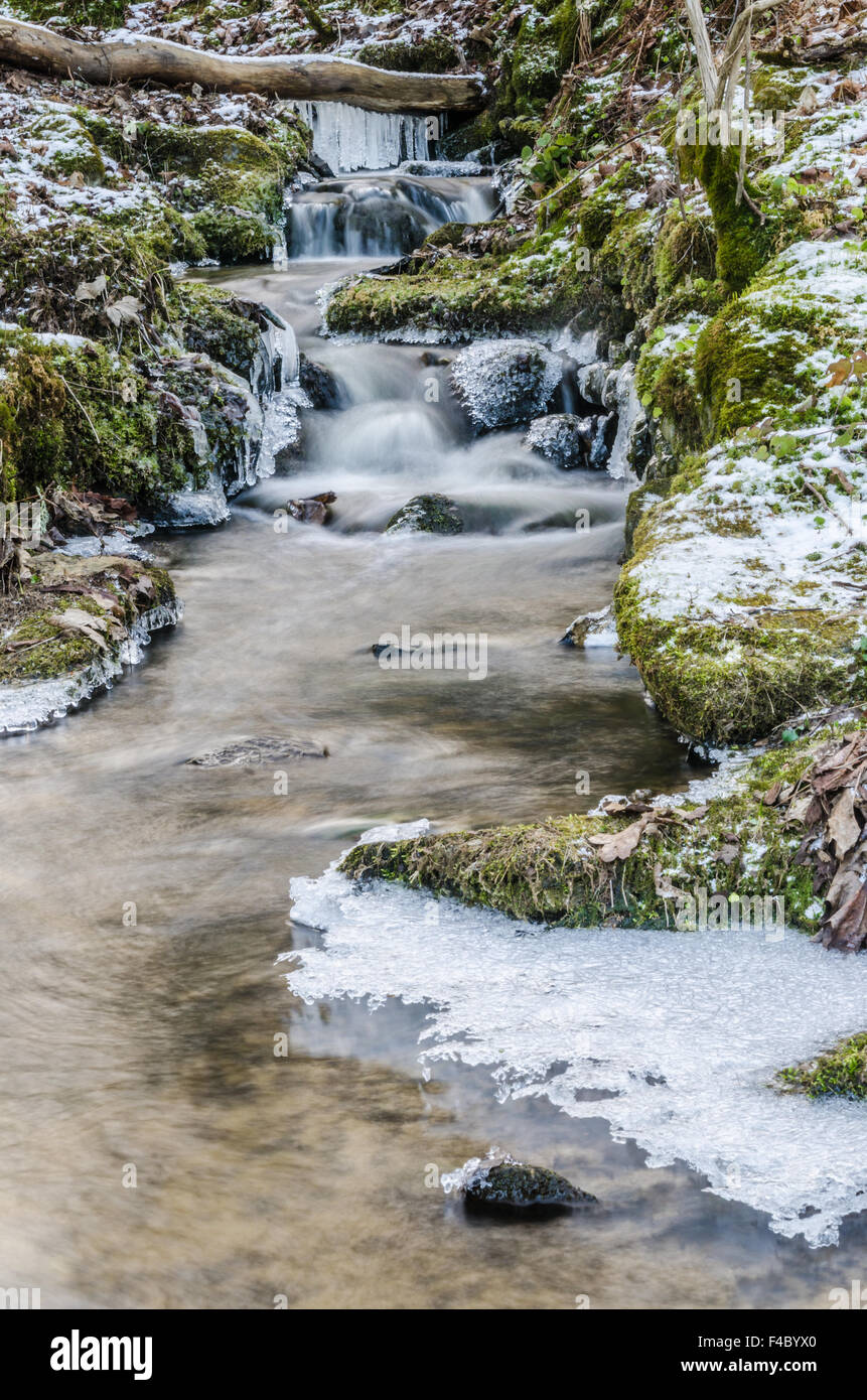 Small creek with a waterfall close up Stock Photo - Alamy