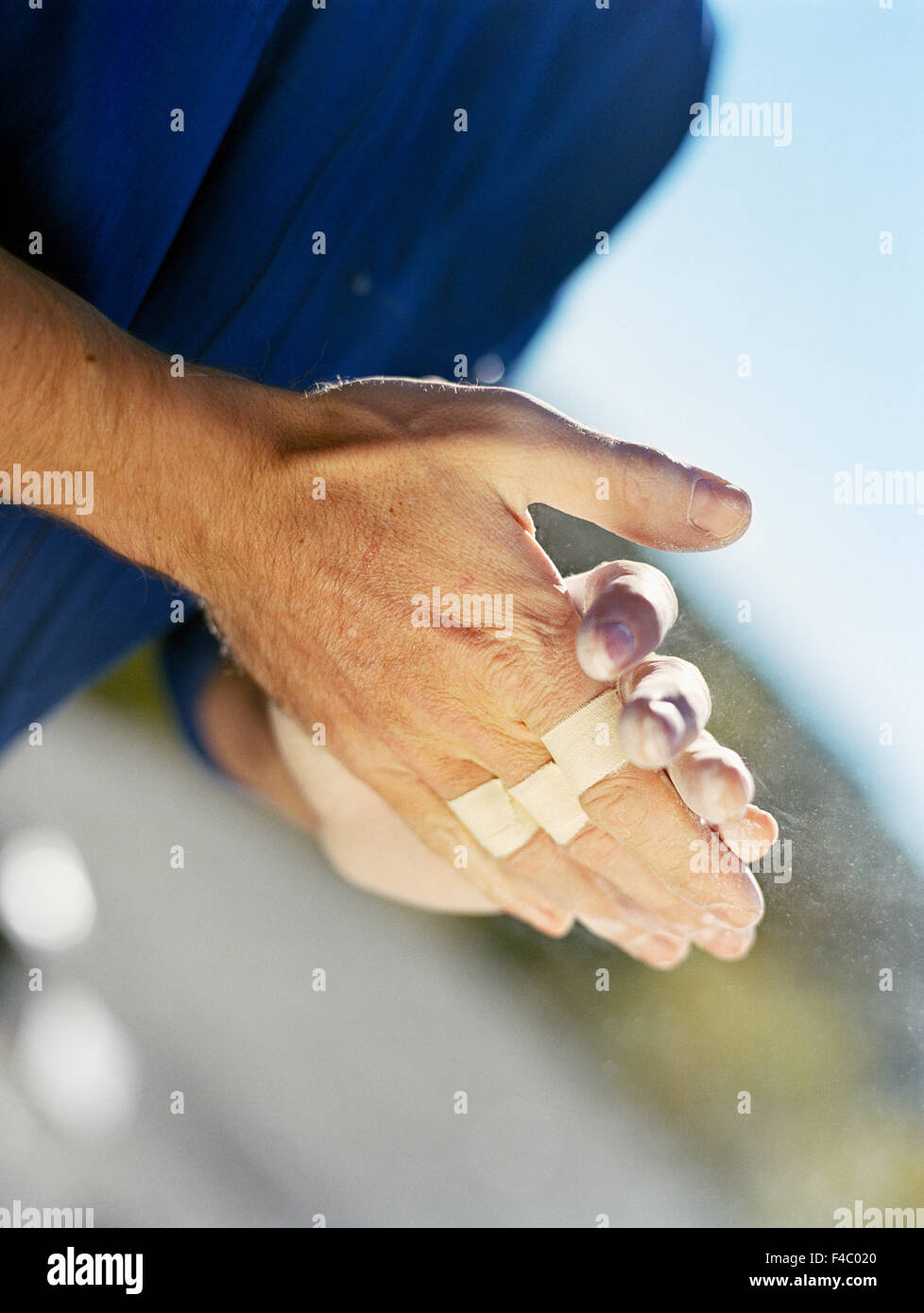 Hands on a male mountain climber Stock Photo - Alamy