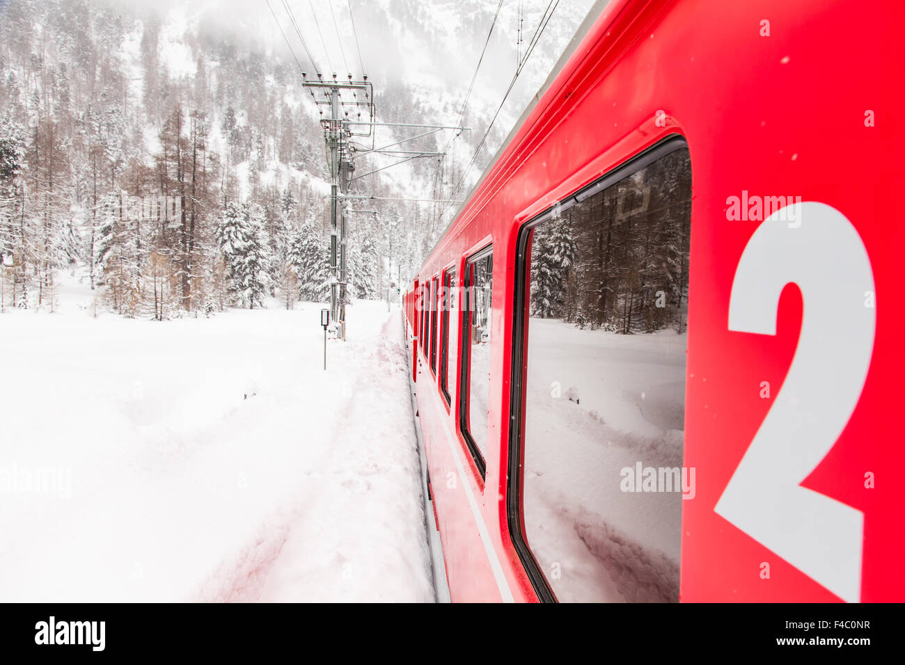 Train in the snow Stock Photo - Alamy