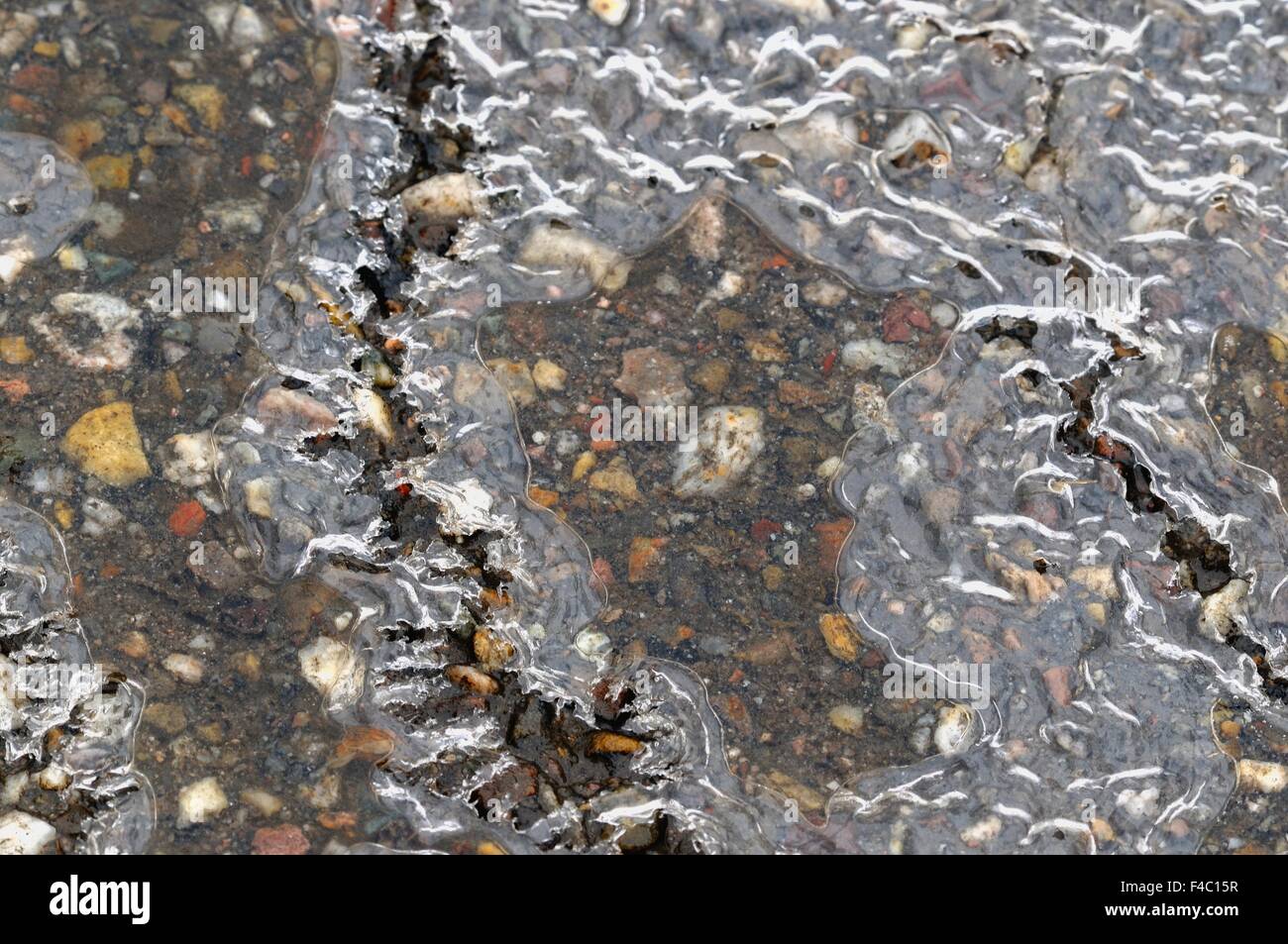 Road surface covered with ice Stock Photo - Alamy