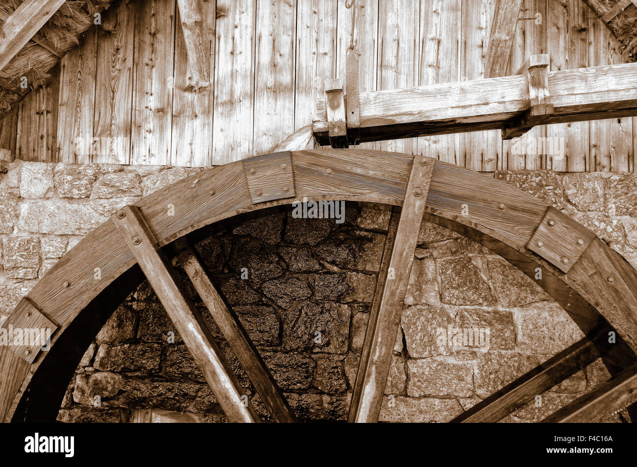 centuries-old technique waterwheel sepia Stock Photo - Alamy