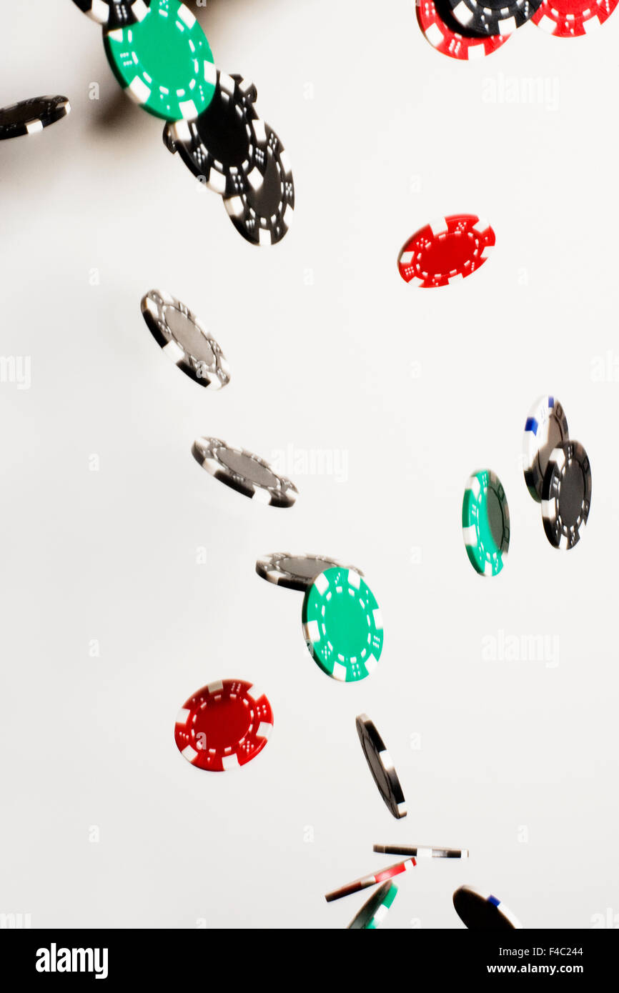 Falling gambling marks Stock Photo - Alamy