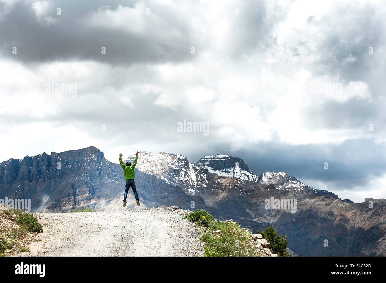 Photographer is jumping with joy Stock Photo - Alamy