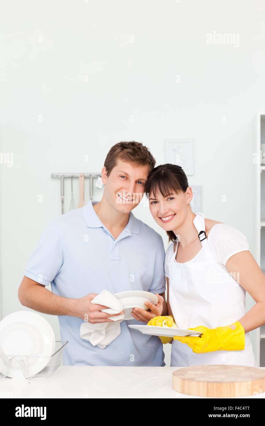 Couple washing dishes together Stock Photo - Alamy