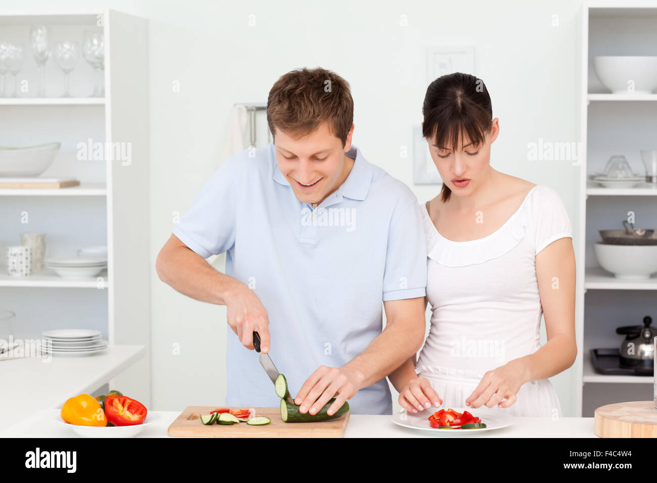 Lovers cooking together in kitchen hi-res stock photography and images ...