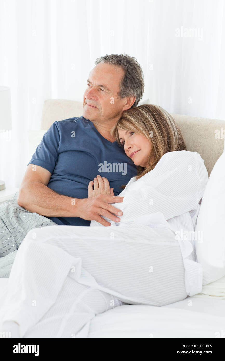 Adult aged couple sleep at the bedroom at home hi-res stock photography ...
