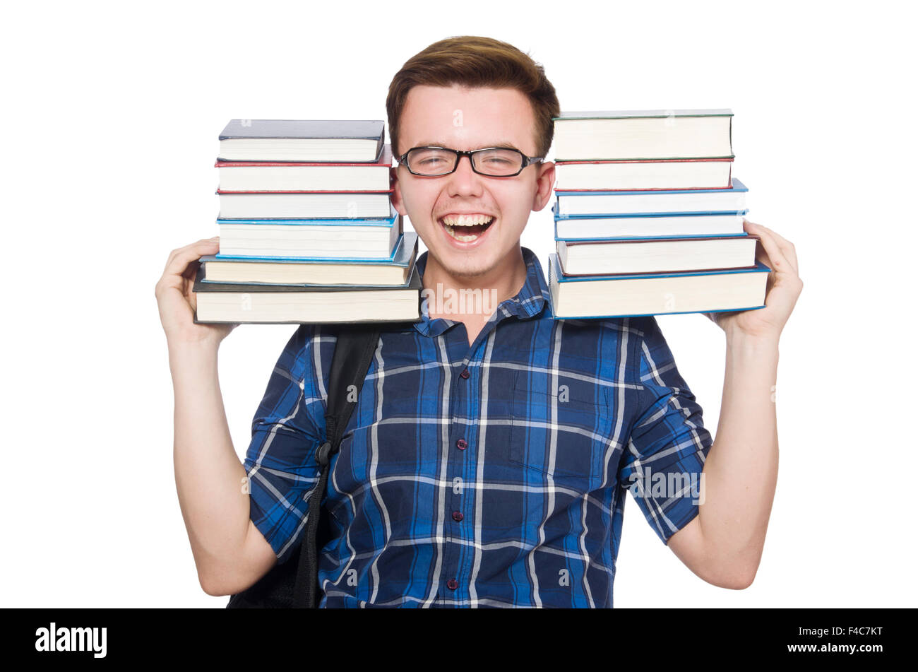 Funny student with stack of books Stock Photo - Alamy