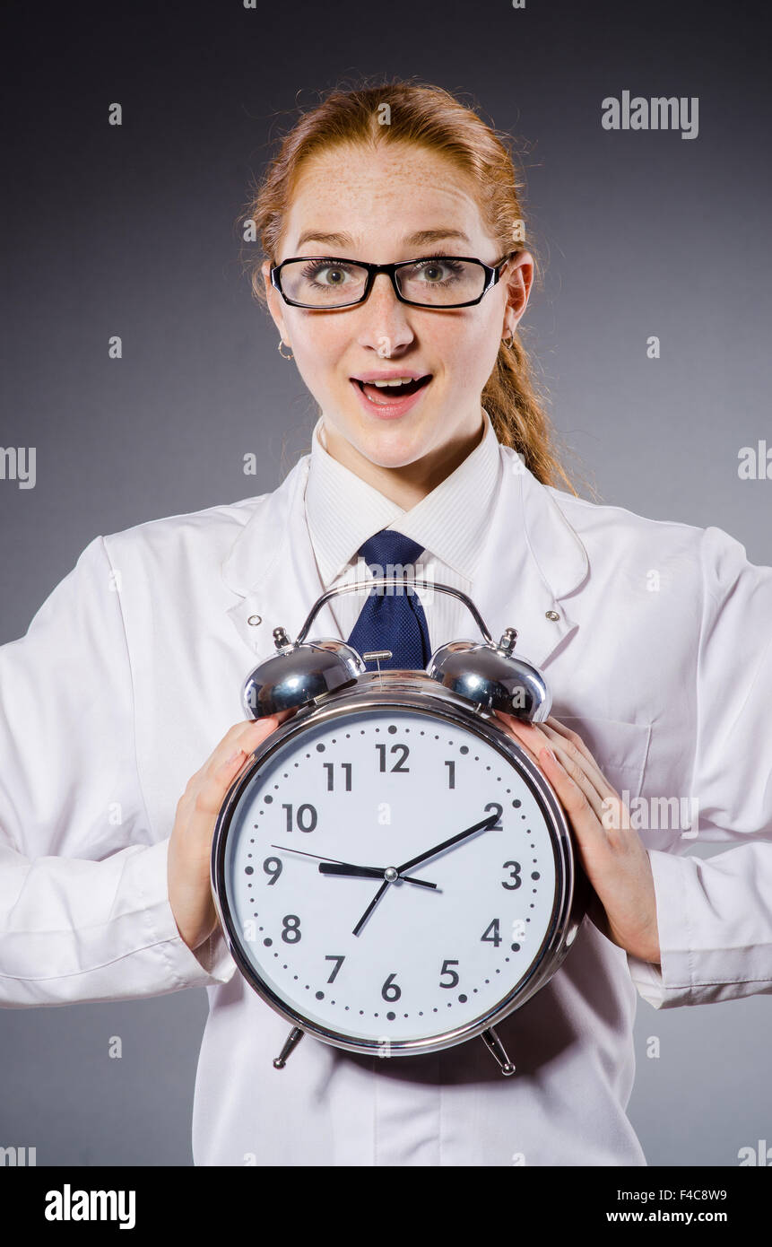 Woman doctor missing her deadlines Stock Photo - Alamy