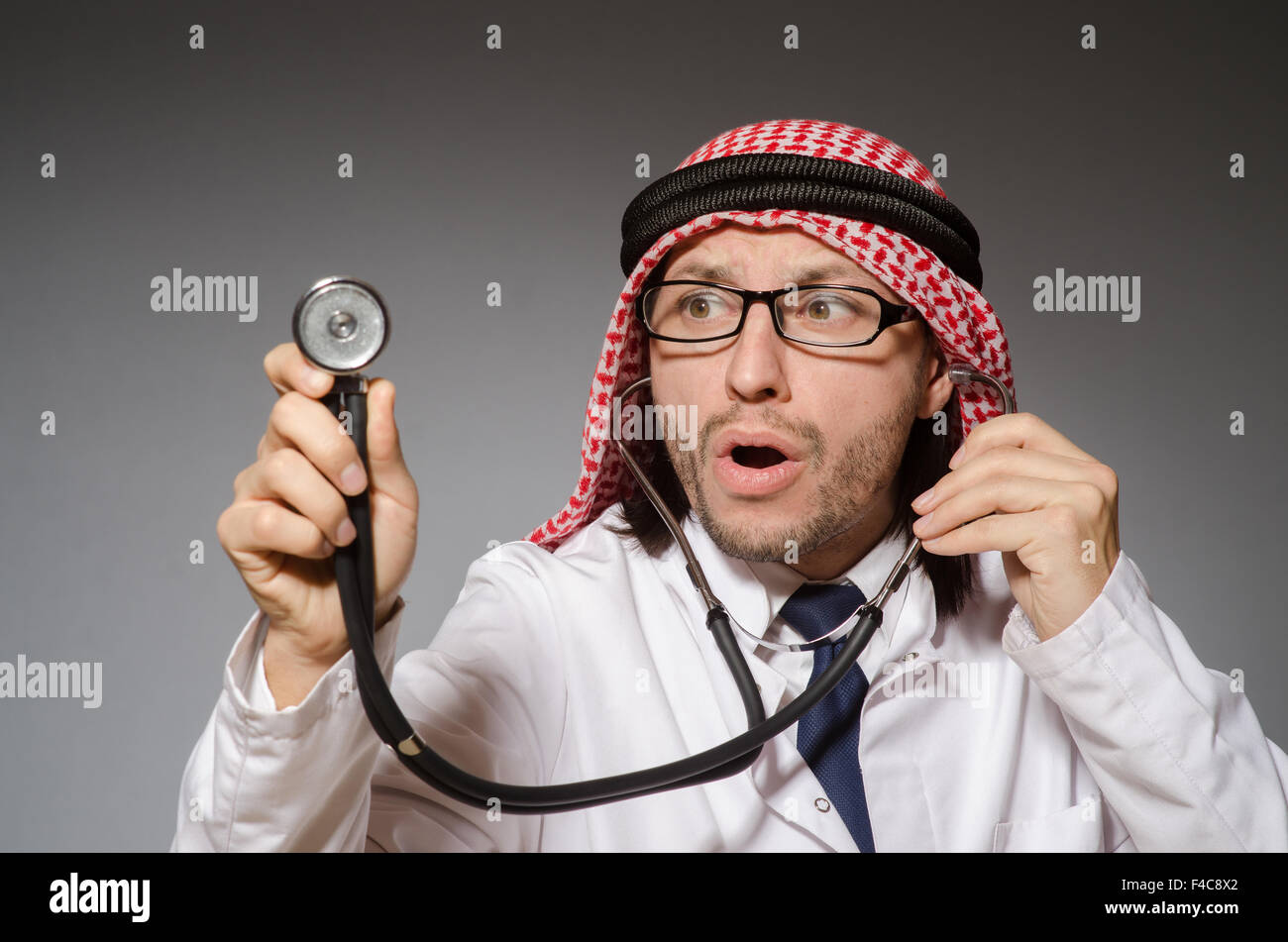 Funny arab doctor with stethoscope Stock Photo - Alamy