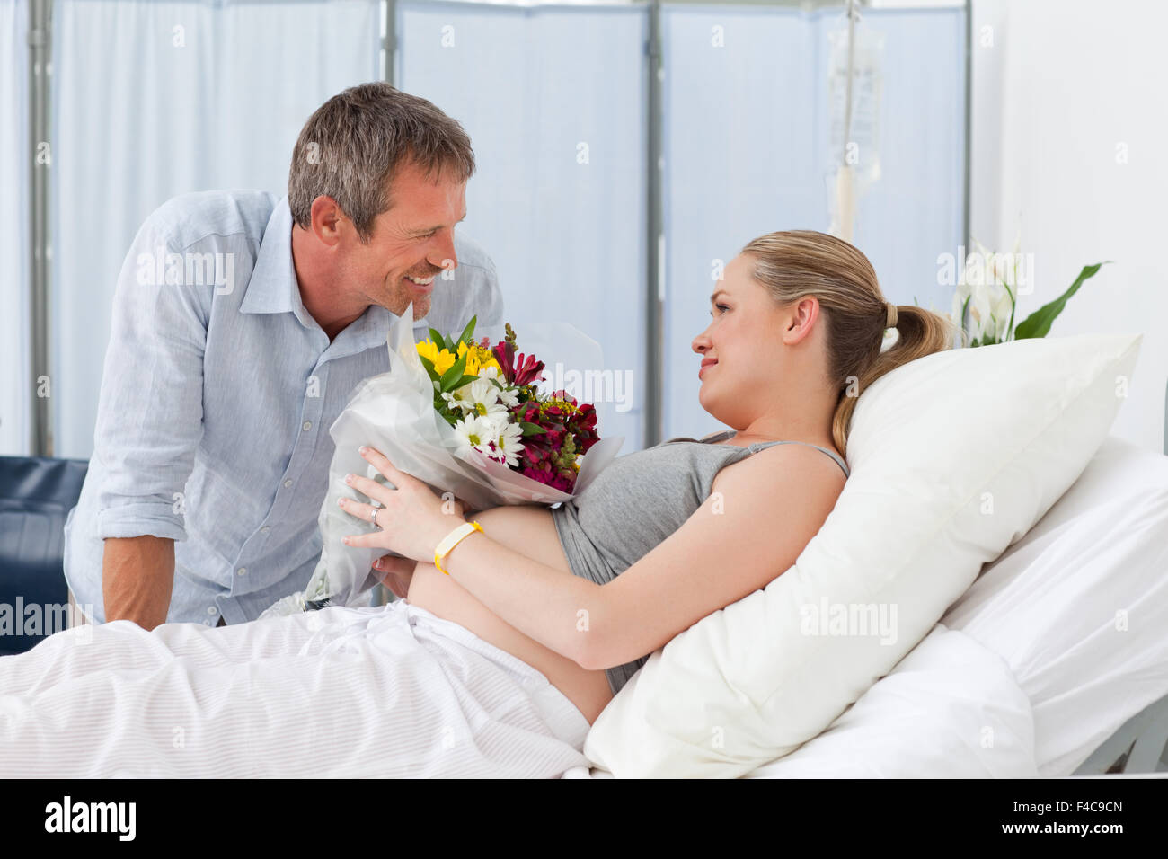 Adorable couple in a hospital room Stock Photo - Alamy