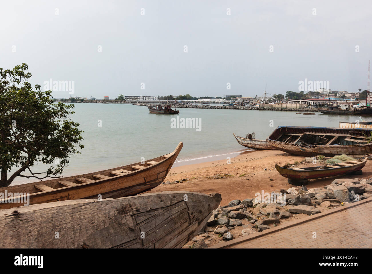 Africa, West Africa, Ghana, Cape Coast, Takoradi. Pirogues on beach ...