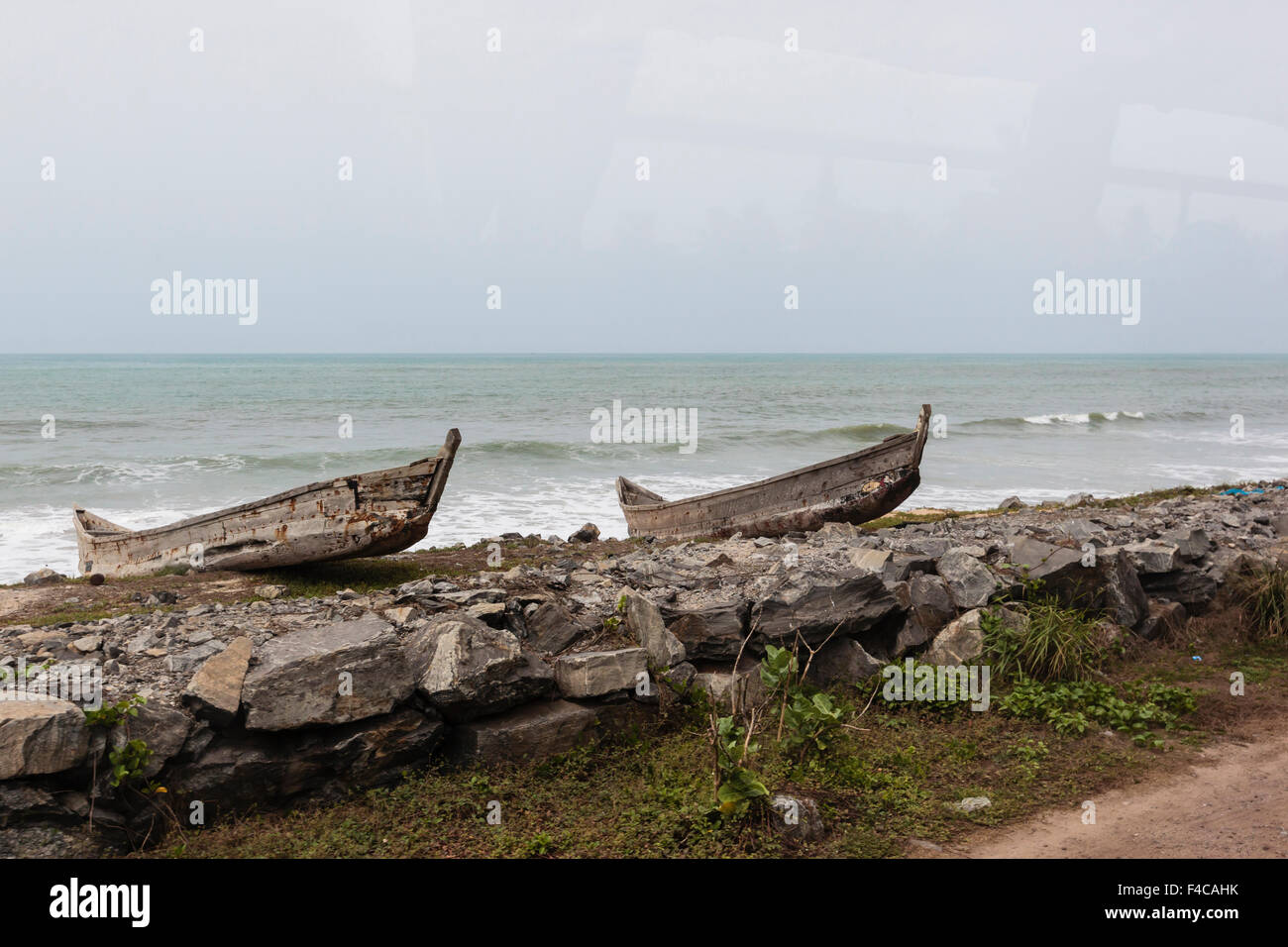 Africa, West Africa, Ghana, Cape Coast. Pirogue on beach Stock Photo ...