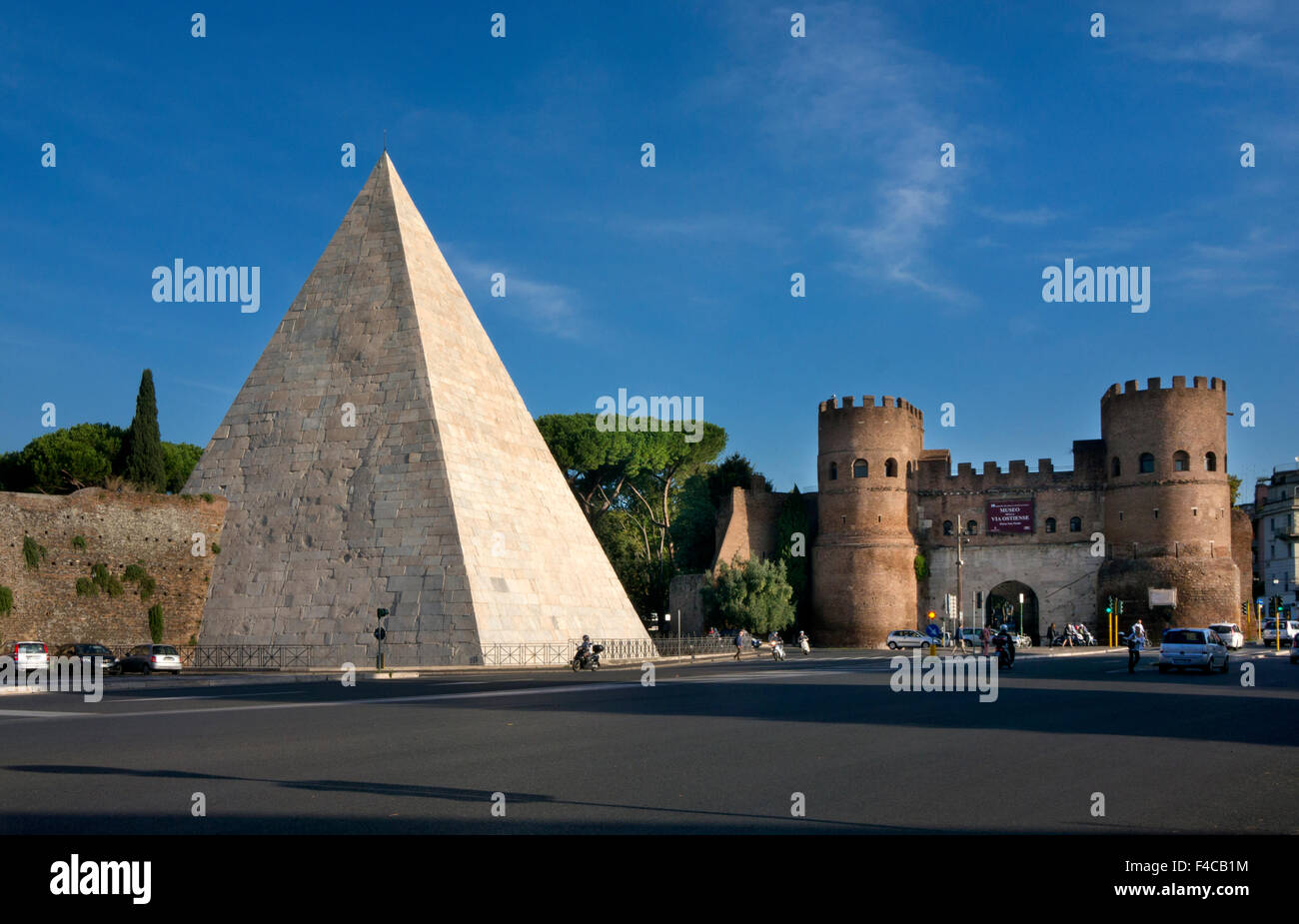 Pyramid of Cestius and Porta San Paolo gateway to city, Rome Italy ...