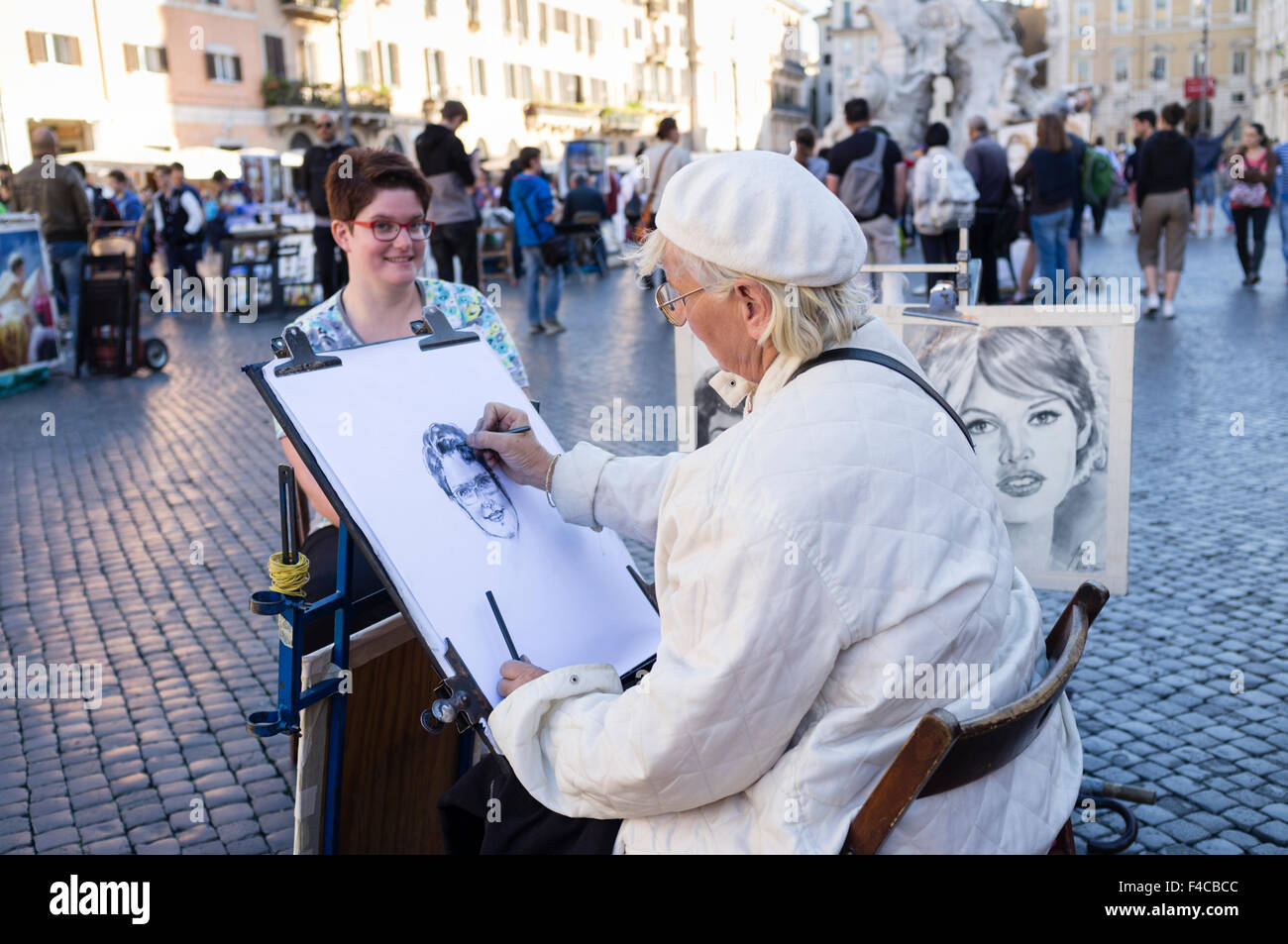 Street portraitist at work. Piazza Navona, Rome, Italy Stock Photo - Alamy