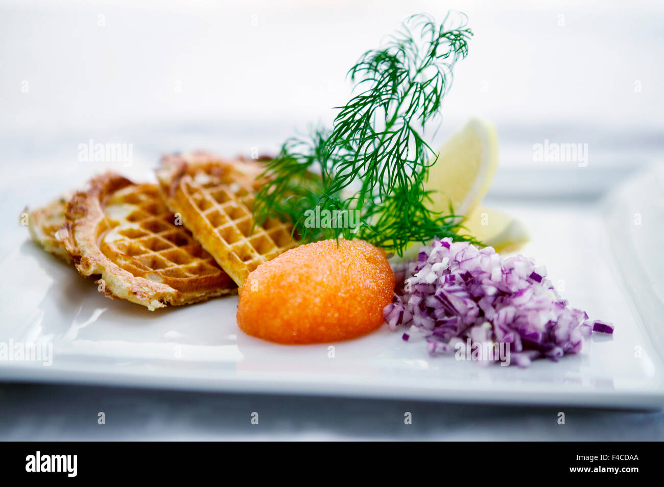 Caviar and waffles Stock Photo - Alamy