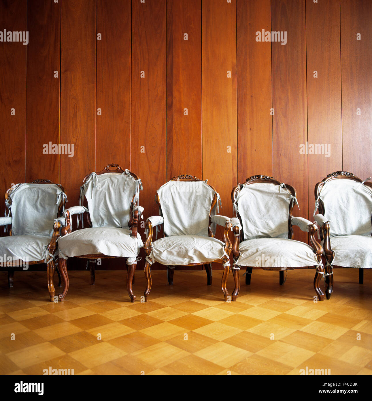 Chairs in a row Stock Photo - Alamy