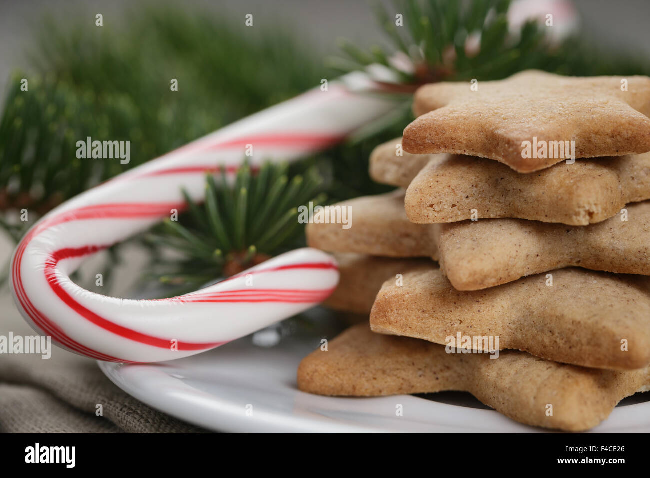 star cookies and candy cane on table Stock Photo - Alamy