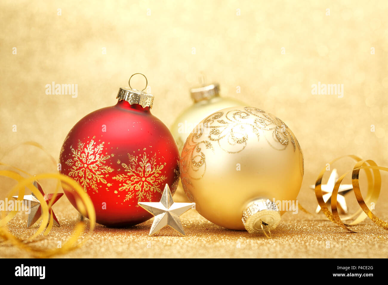 Christmas balls on glitter background Stock Photo - Alamy