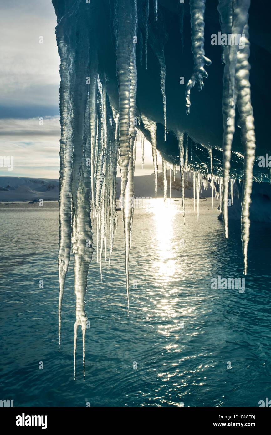 Antarctica, Icicles hang from melting iceberg floating near Enterprise ...