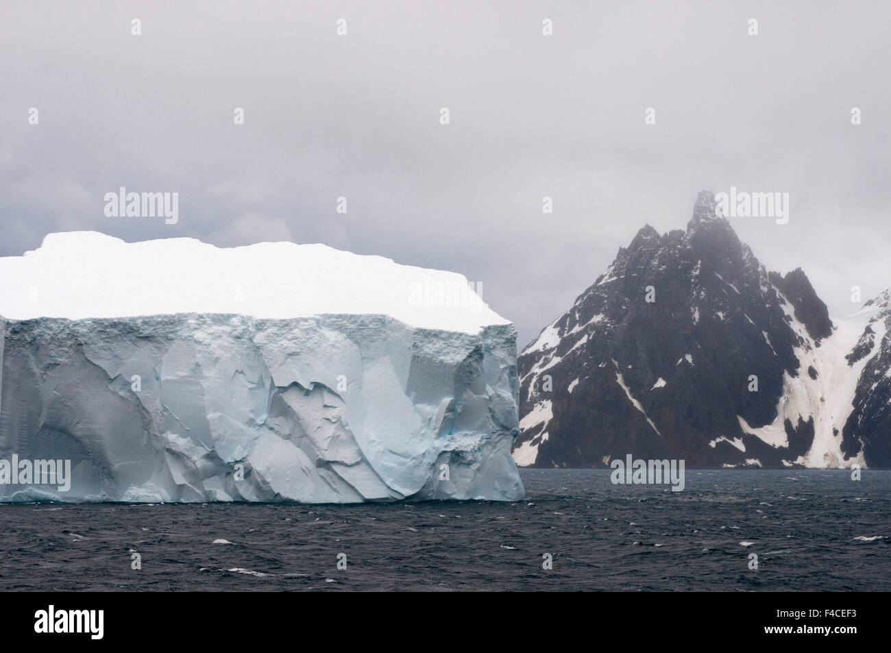Antarctica. Bransfield Strait. Iceberg under stormy skies Stock Photo ...