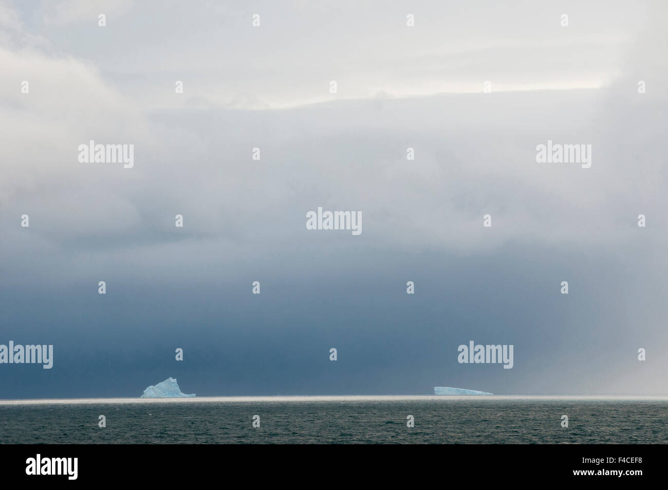Antarctica. Bransfield Strait. Iceberg under stormy skies Stock Photo ...