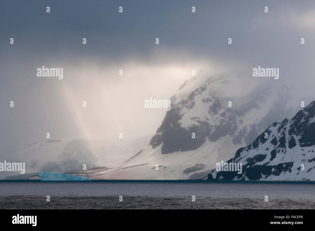 Antarctica. Bransfield Strait. Iceberg under stormy skies Stock Photo ...