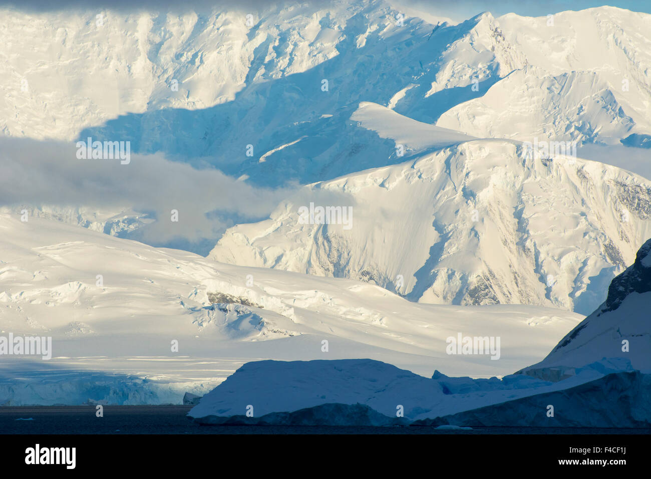 Antarctica. Paradise Harbor. Bright sunlight on the mountains beyond ...