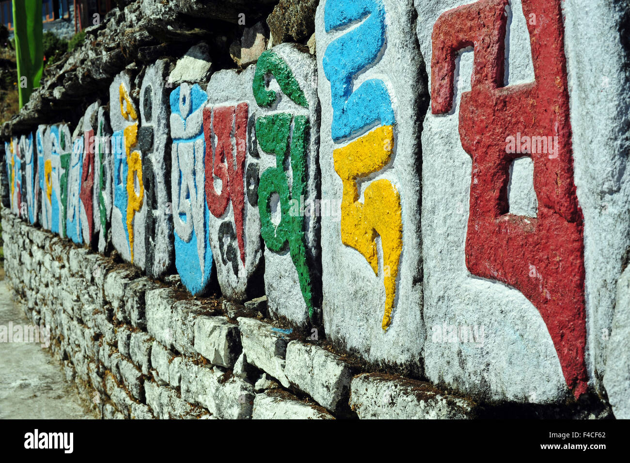 India, West Bengal, Meghma, Buddhist colorful script and stupa at the ...
