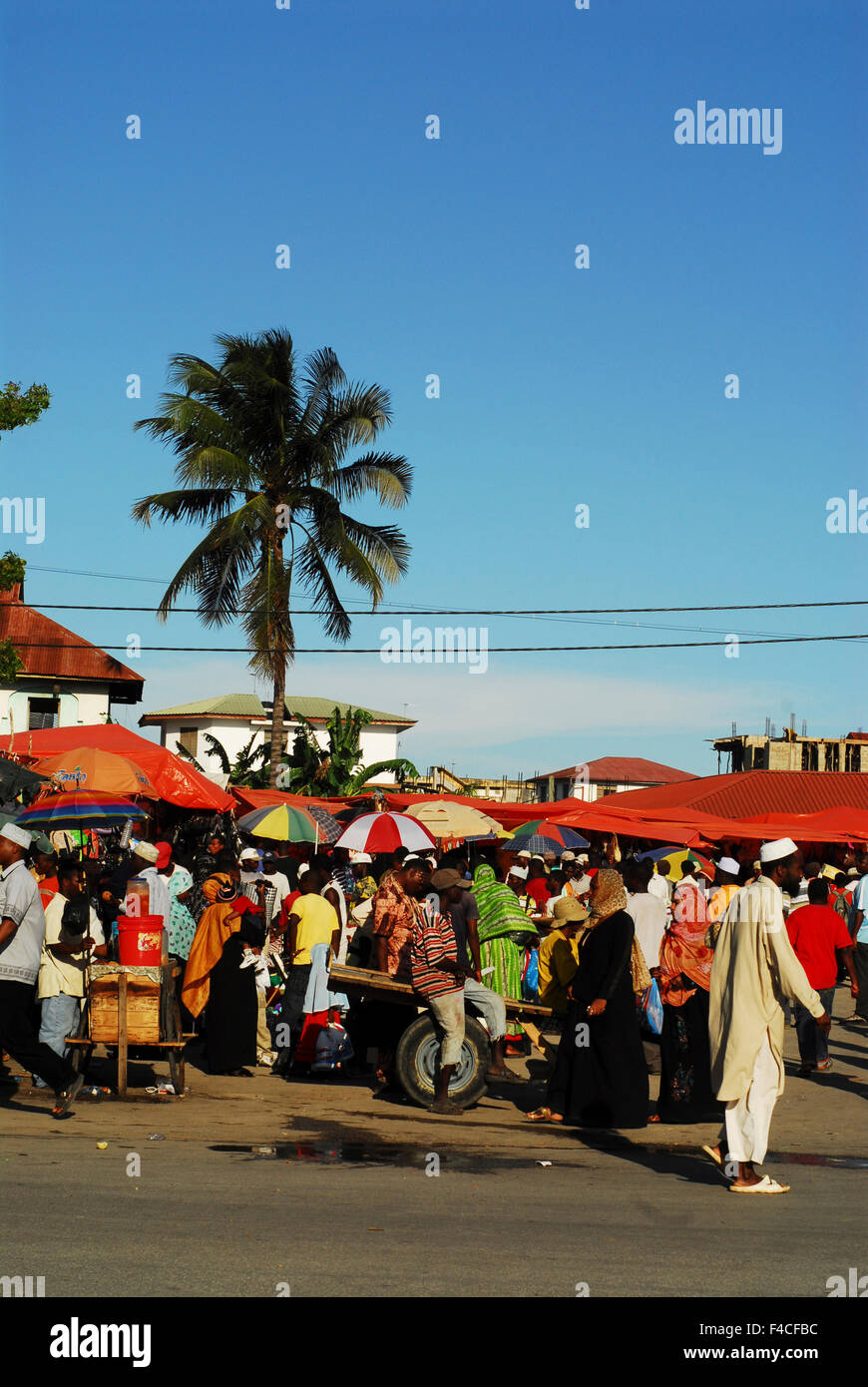Tanzania, Zanzibar, Stone Town, market scene with many people shopping ...