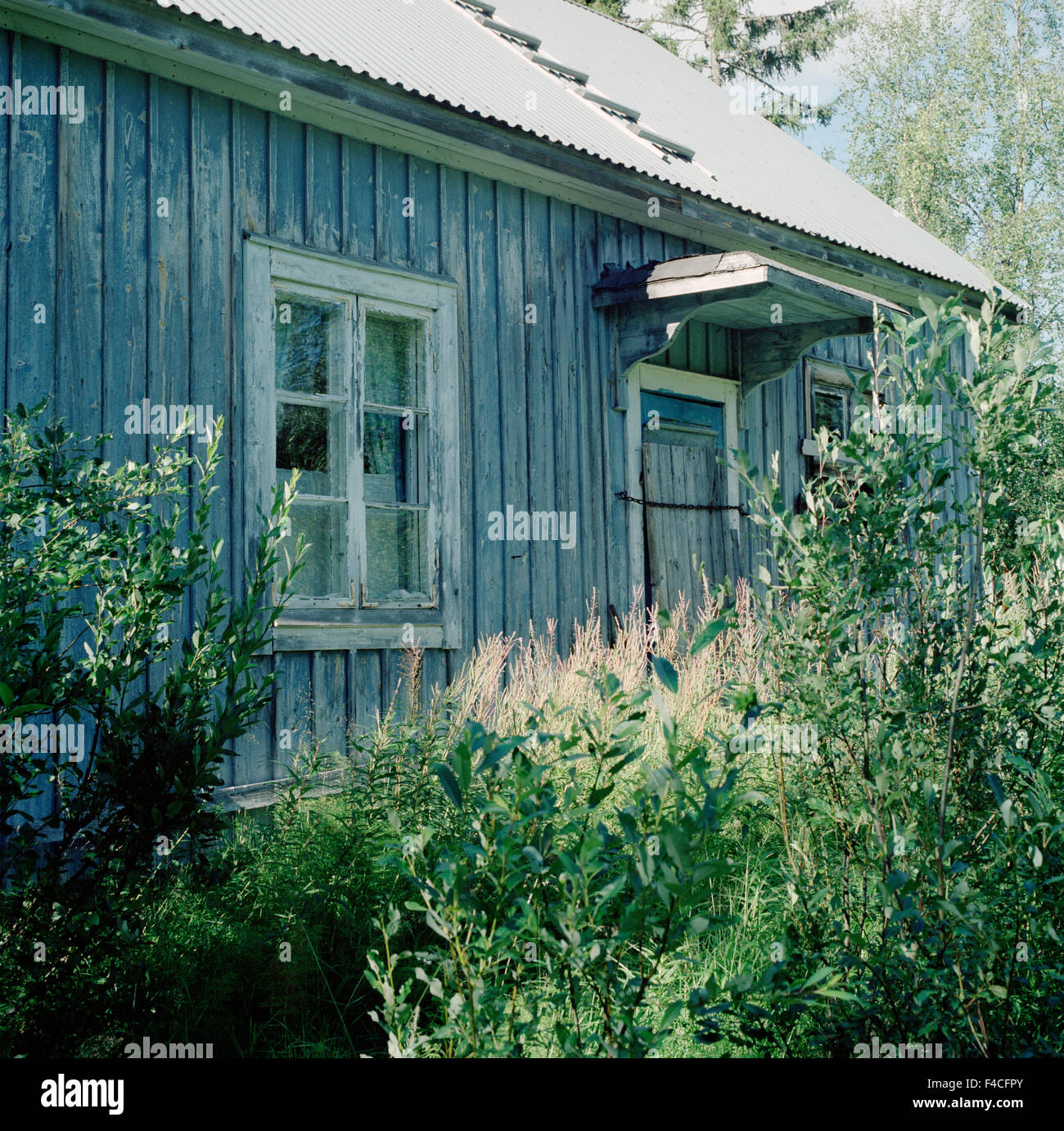 Closed wooden house, side view Stock Photo - Alamy