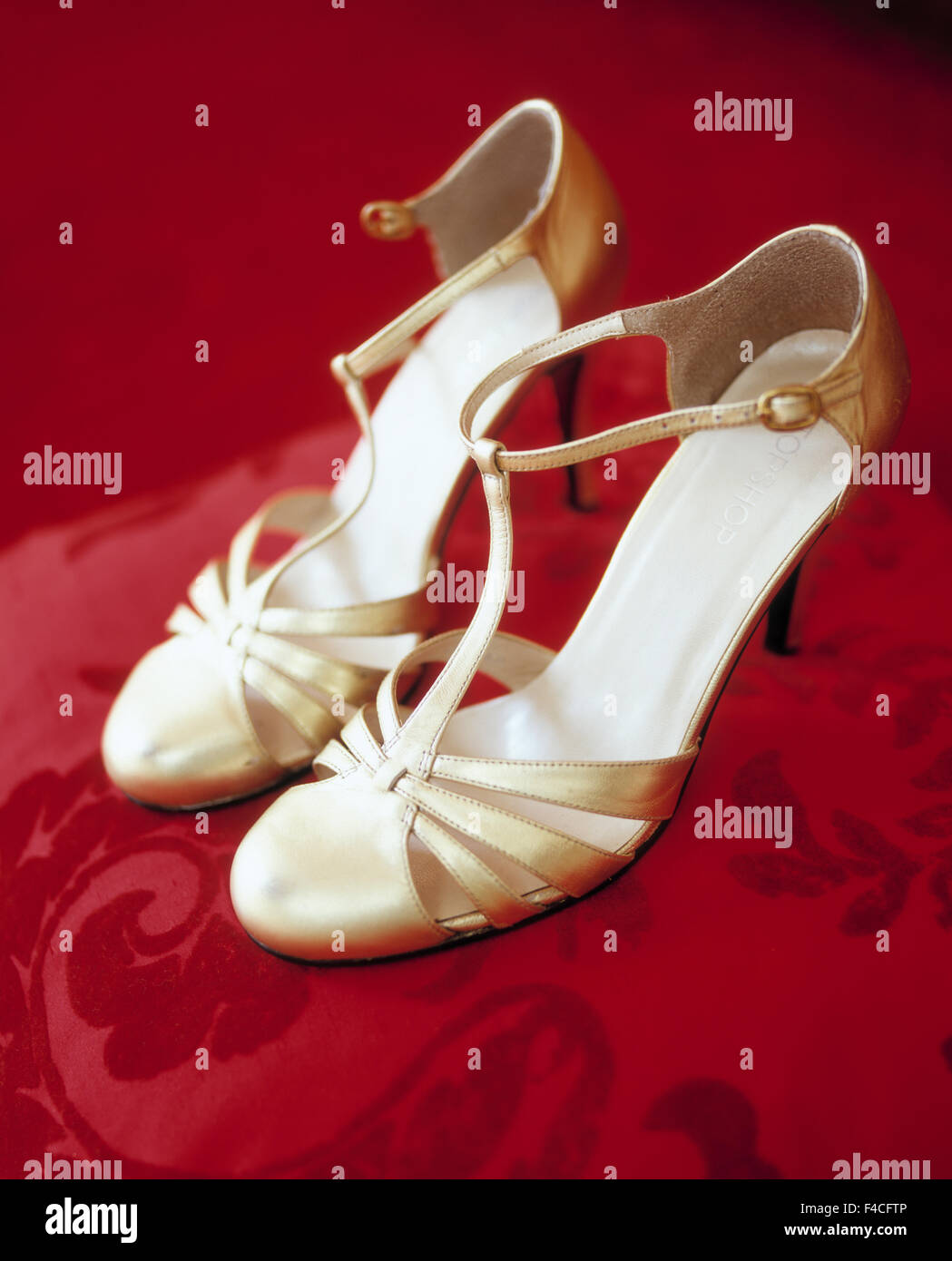 Gold color shoes hi-res stock photography and images - Alamy