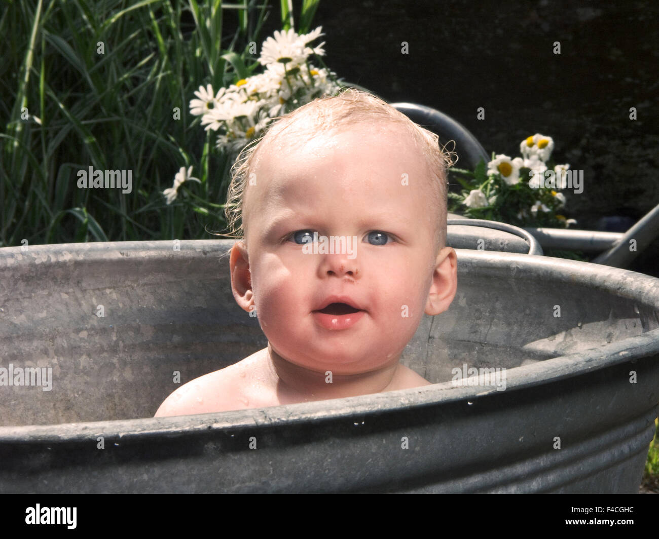 A Baby Bathing in a Barrel Stock Photo - Alamy