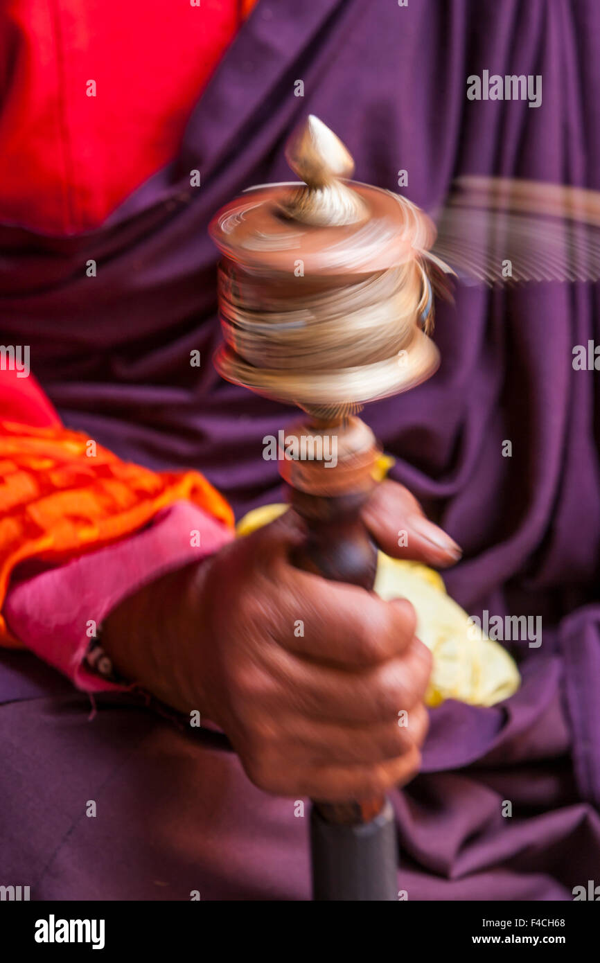 Close up with a Buddhist and a hand-held prayer wheel, Bhutan Stock ...