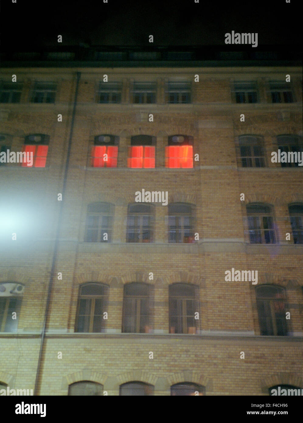 Red Lights in Windows Stock Photo - Alamy