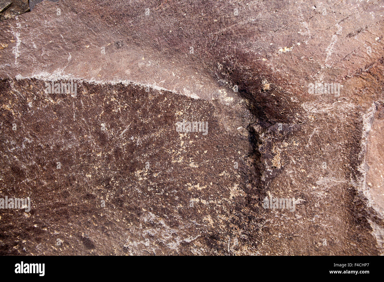 Closeup of a red stone structure for background Stock Photo - Alamy